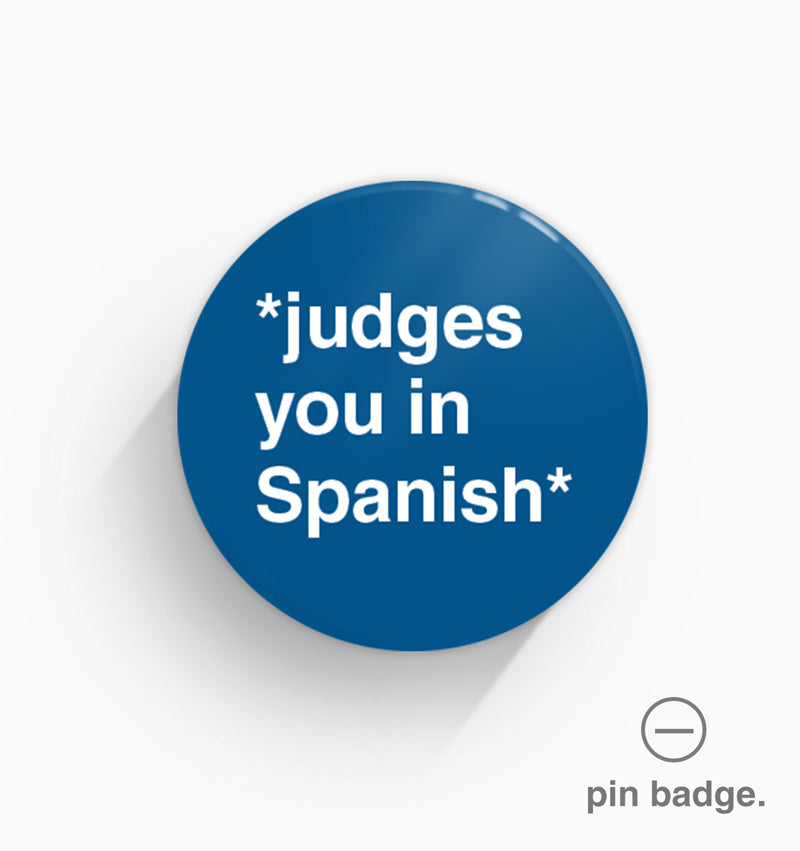 "*Judges You In Spanish*" Pin Badge - Greetings From Hell